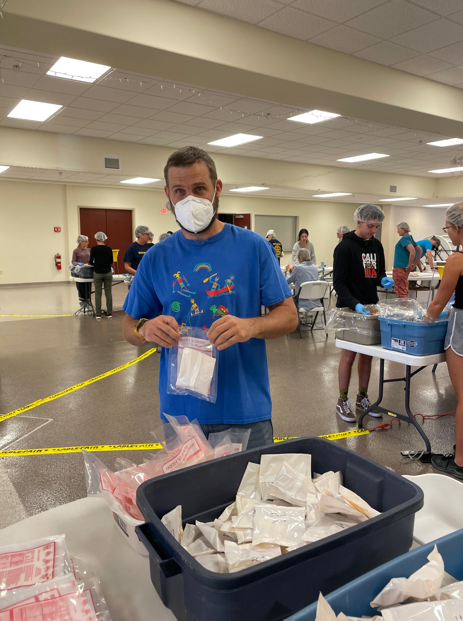 Rotary Club And Community Volunteers Pack 35,328 Servings Of Food ...